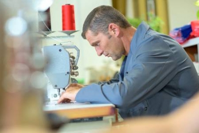 MALE SEWING machinist